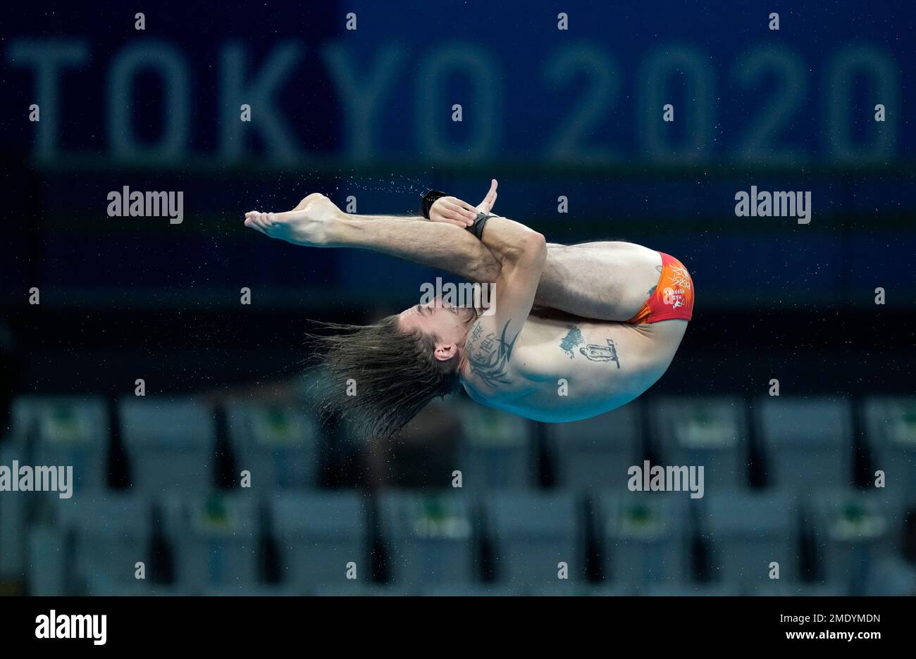 Matthieu Rosset of France competes in men's diving 10m platform ...