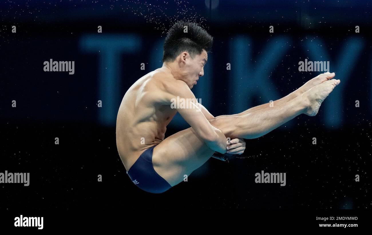 Haram Woo of South Korea competes in men's diving 10m platform ...