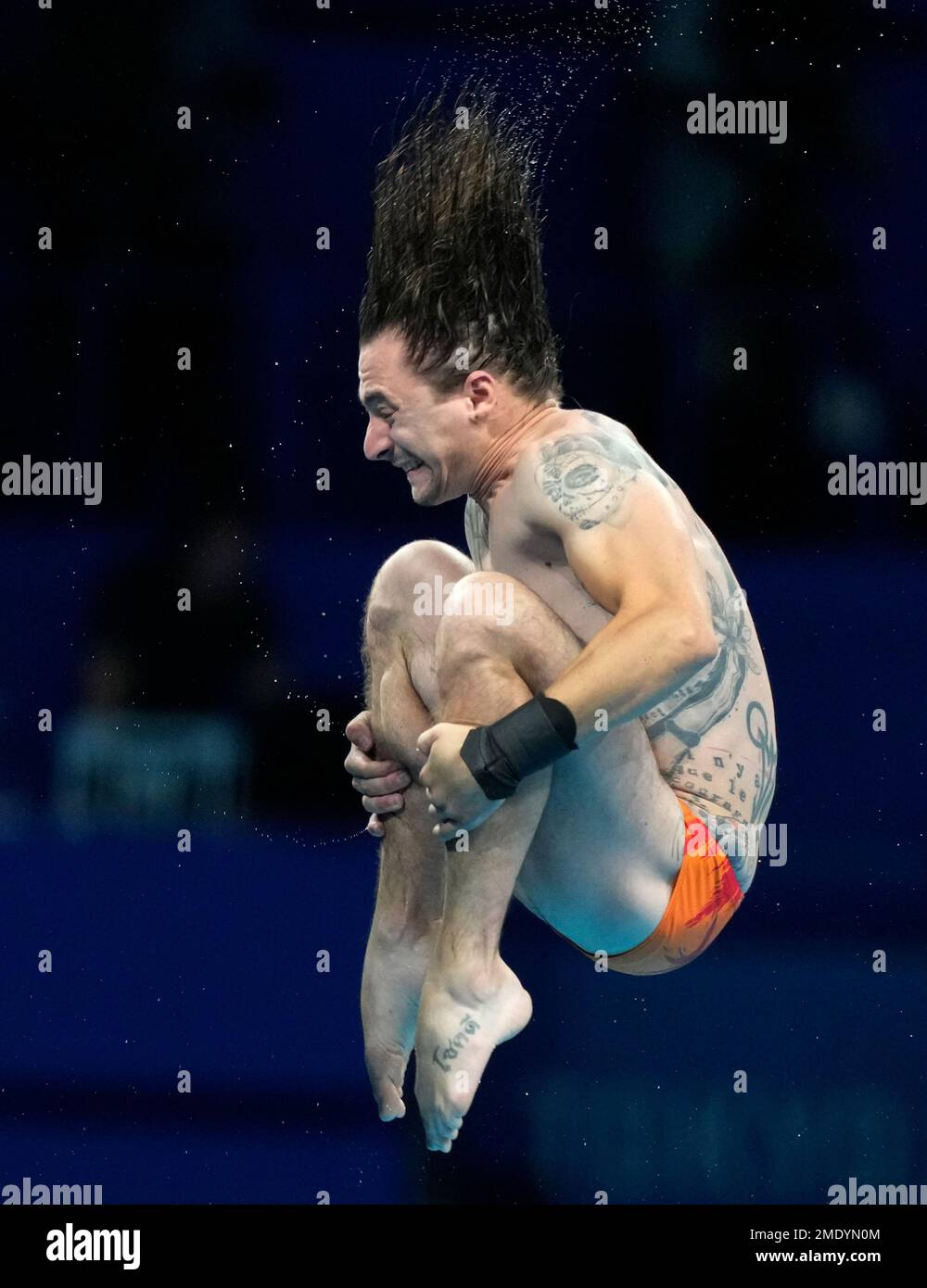 Matthieu Rosset of France competes in men's diving 10m platform ...