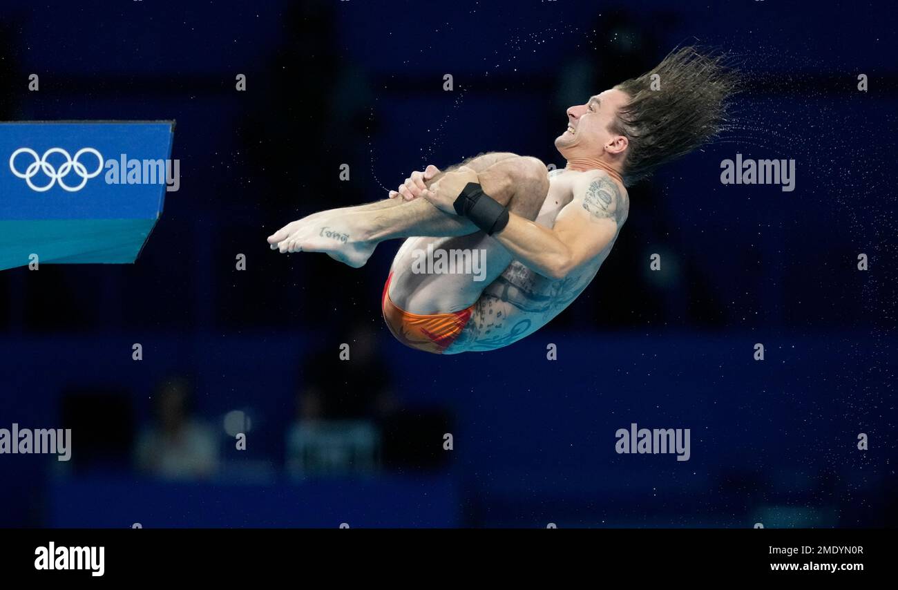 Matthieu Rosset of France competes in men's diving 10m platform ...