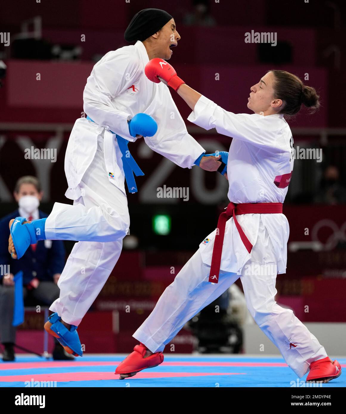 Btissam Sadini of Morocco, left, and Jovana Prekovic of Serbia compete ...