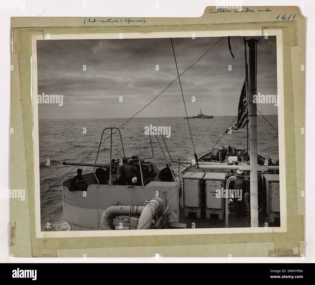 The Coast Guard Cutter Spencer is depicted before engaging and sinking ...