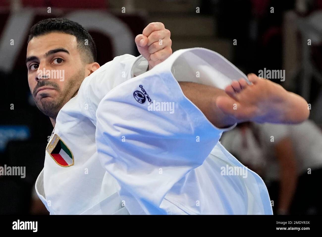 Sayed Mohammed Almosawi of Kuwait competes in the elimination round of ...