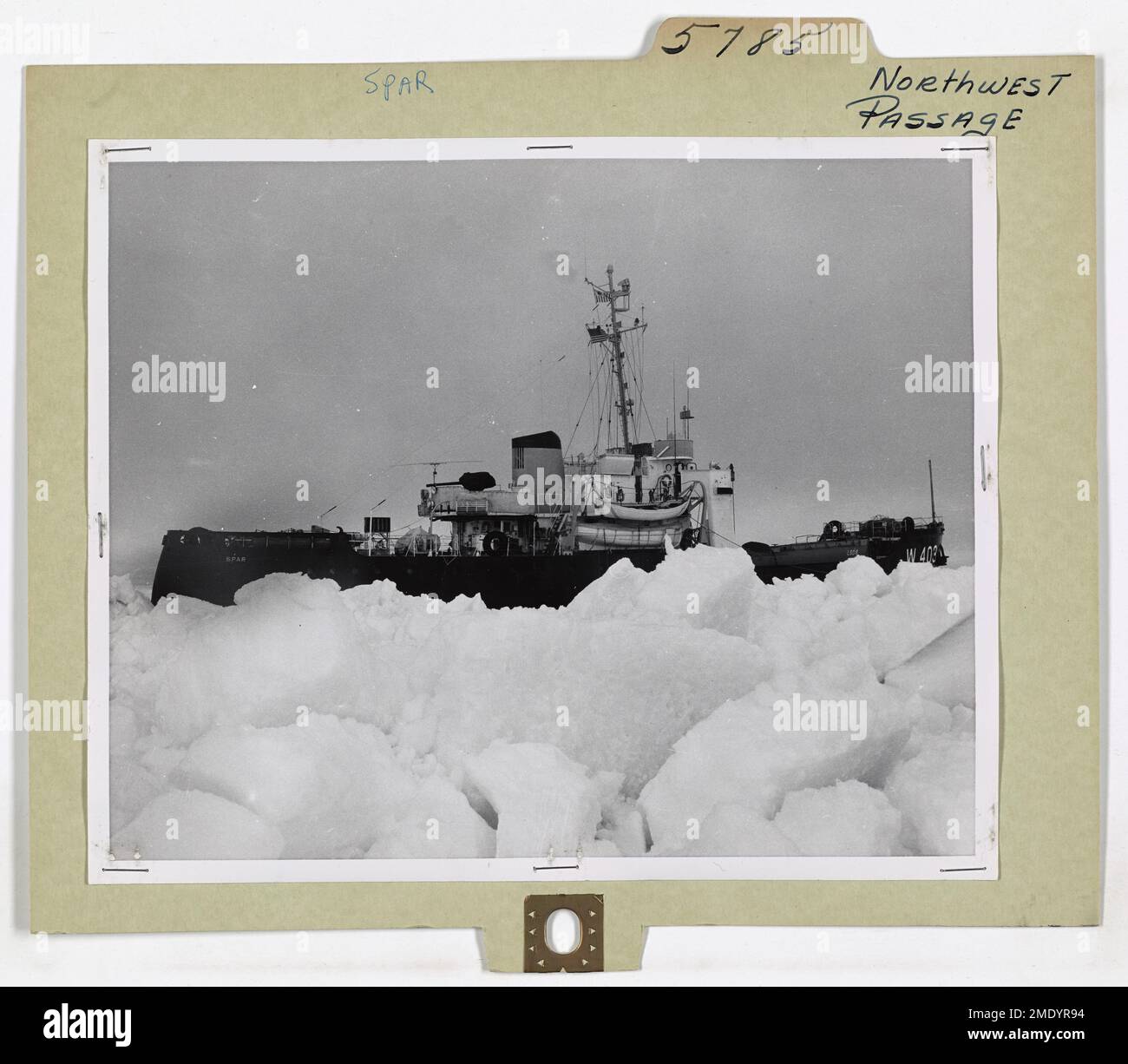 The U.S. Coast Guard buoy tender Spar, surrounded by Arctic ice ...
