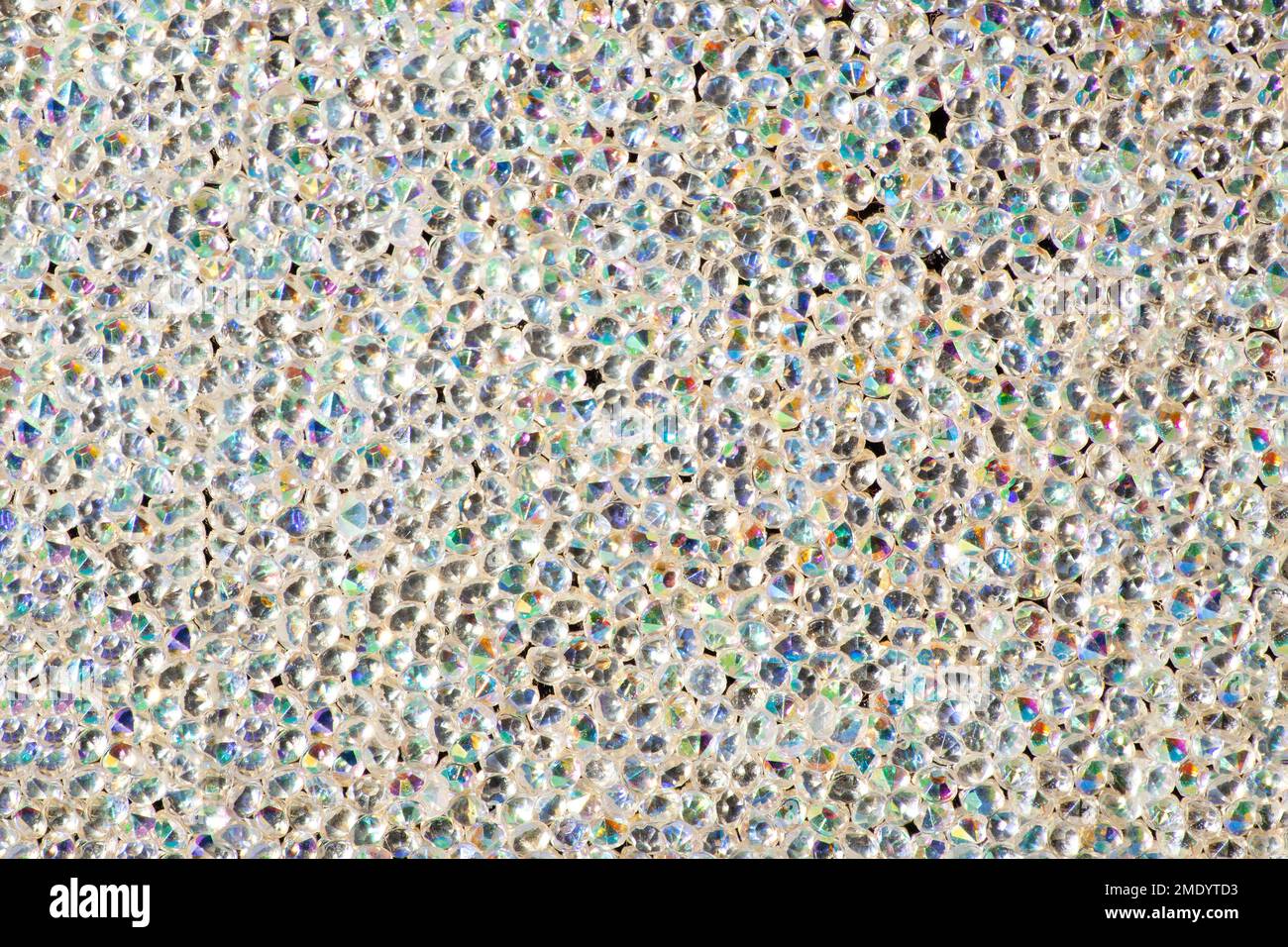 Abstract rhinestones background. Texture of rhinestones illuminated ...