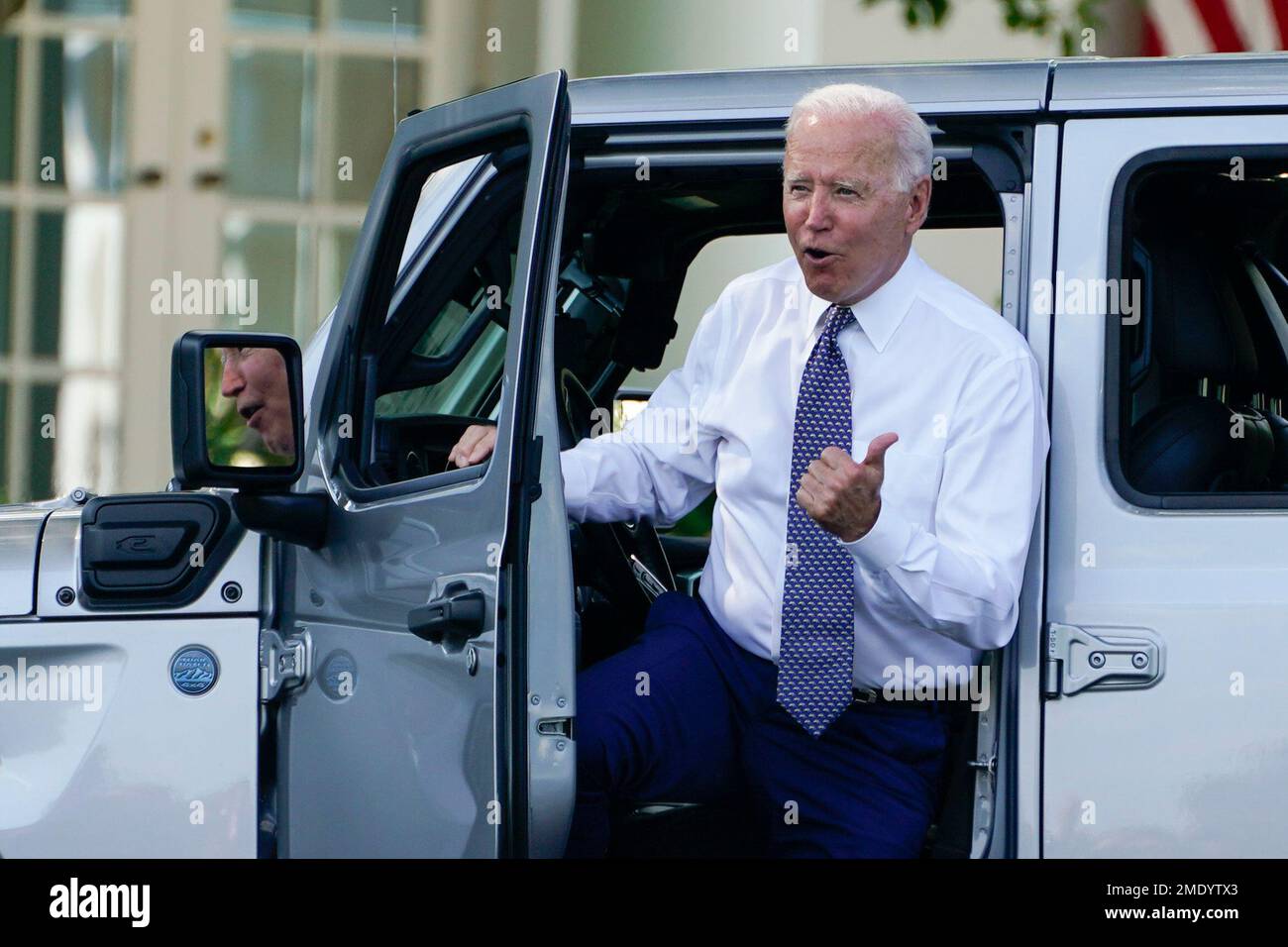 President Joe Biden sits in a Jeep Wrangler Rubicon 4xE during an event ...