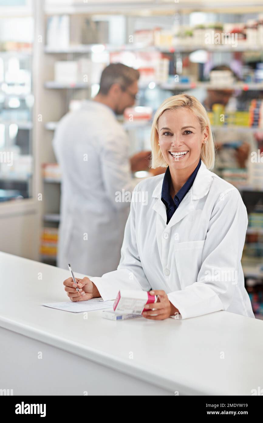 Portrait of pharmacist woman writing medicine notes, product or ...