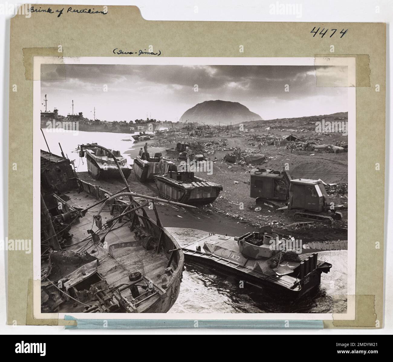 Amtracs and other vehicles are depicted on the volcanic sands of a ...