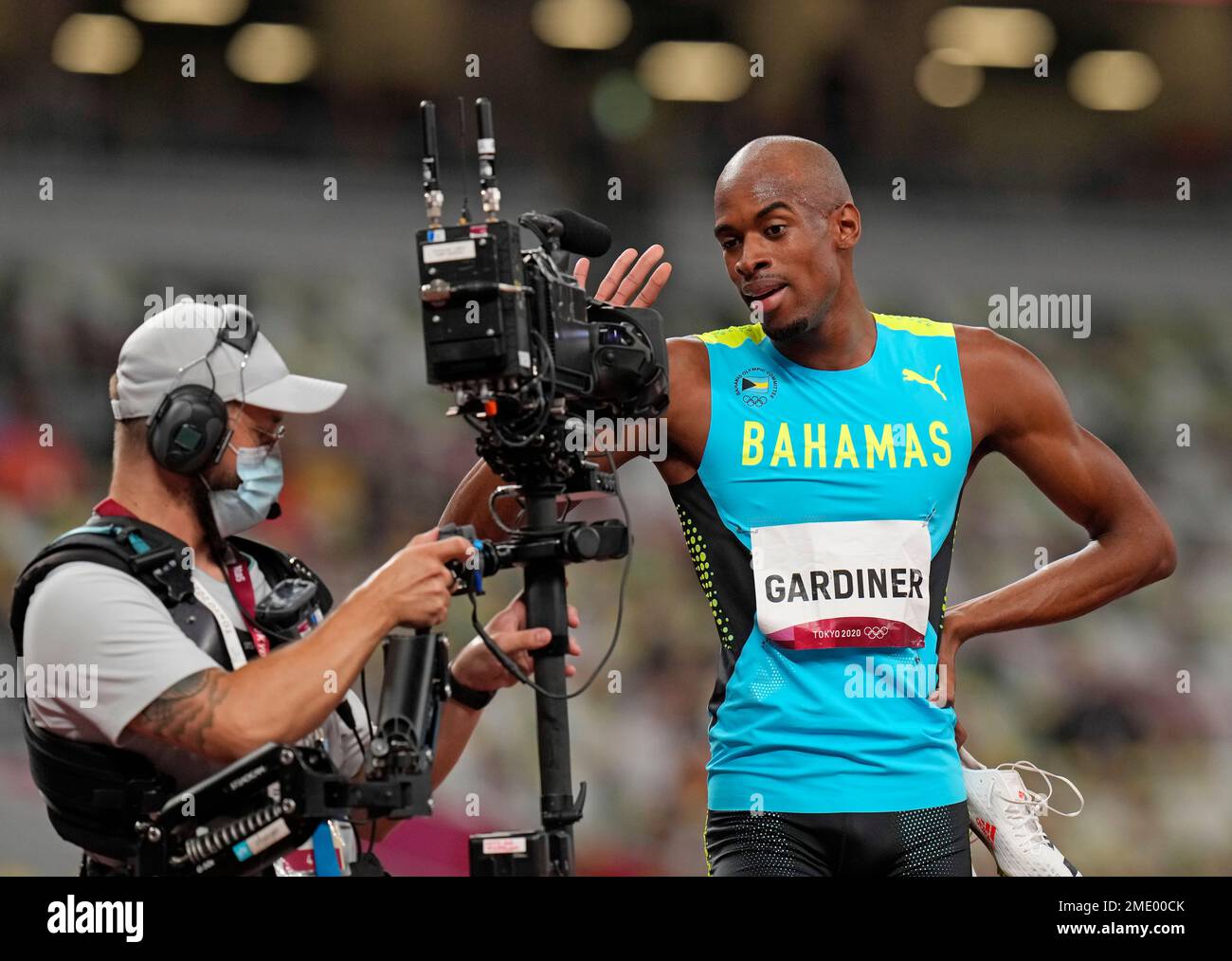 Steven Gardiner, of Bahamas reacts after winning the gold medal in the ...
