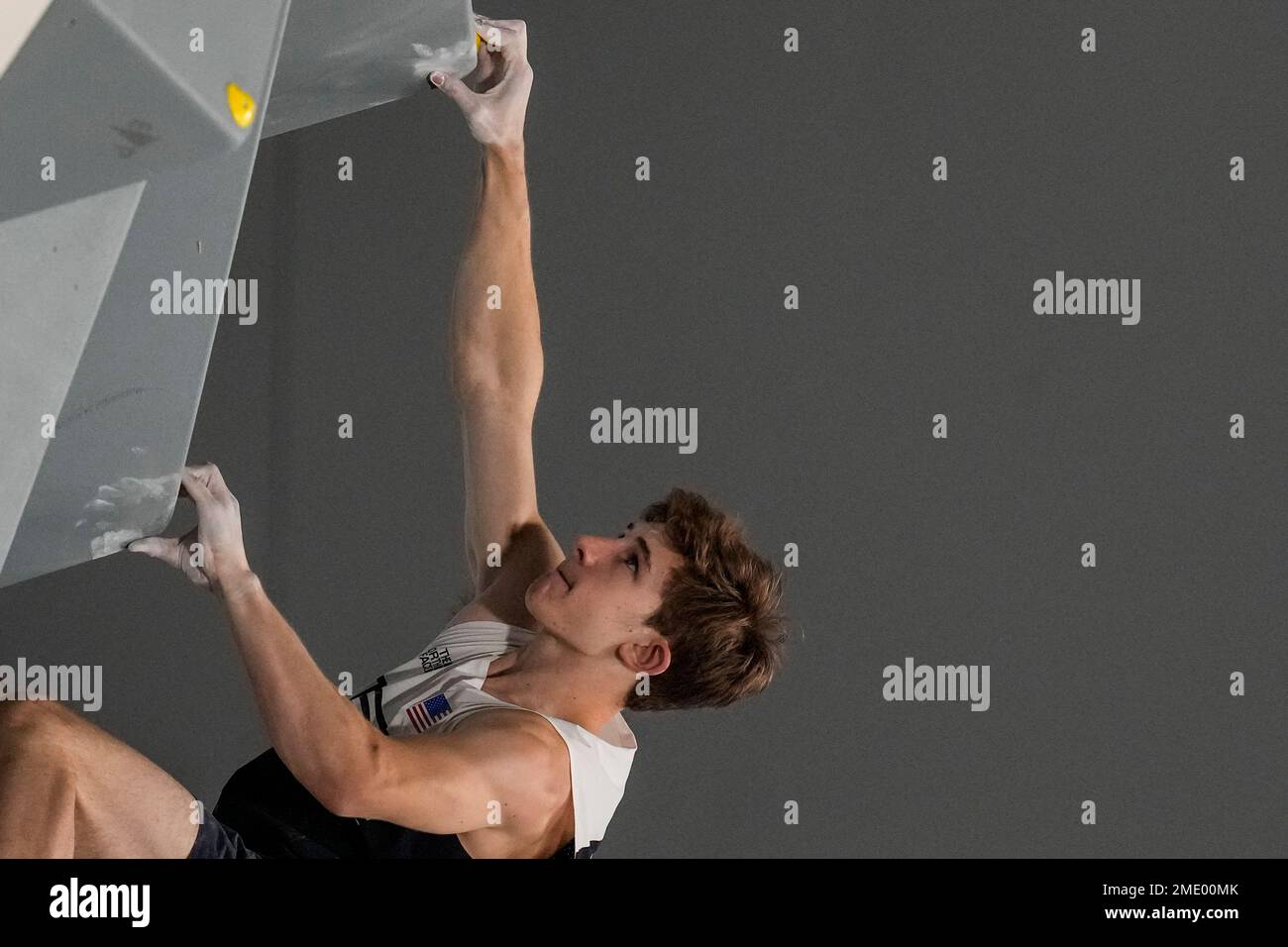 Colin Duffy, of the United States, competes during the bouldering ...