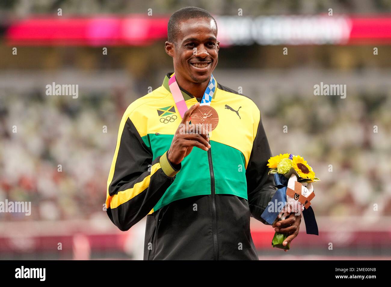 Bronze medalist Ronald Levy, of Jamaica, poses during the medal ...
