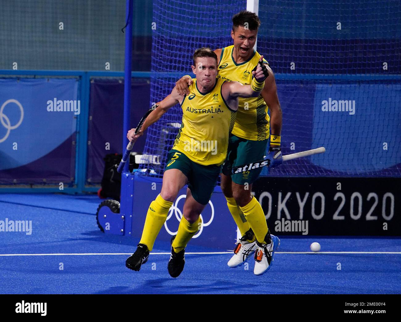 Australia's Tom Joseph Wickham (5) celebrates with Tim Brand (29) after ...
