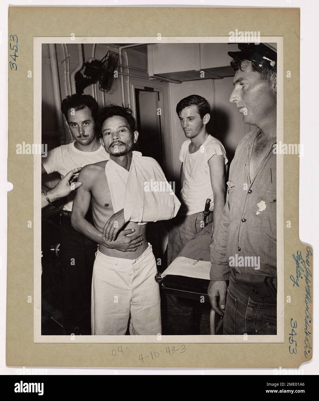 A Japanese prisoner of war, wounded during the conquest of Parry Island ...