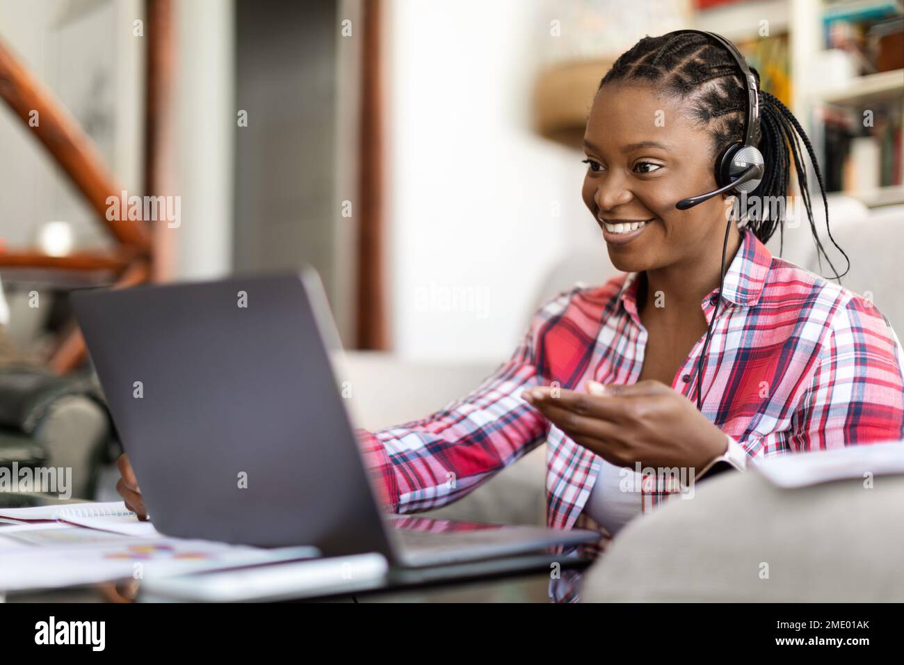Young teacher remote from home hi-res stock photography and images - Alamy