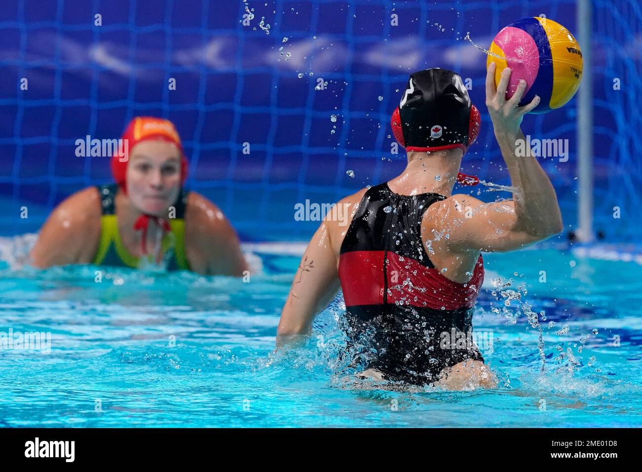 Canada's Axelle Crevier, right, winds up to shoot against Australia's ...