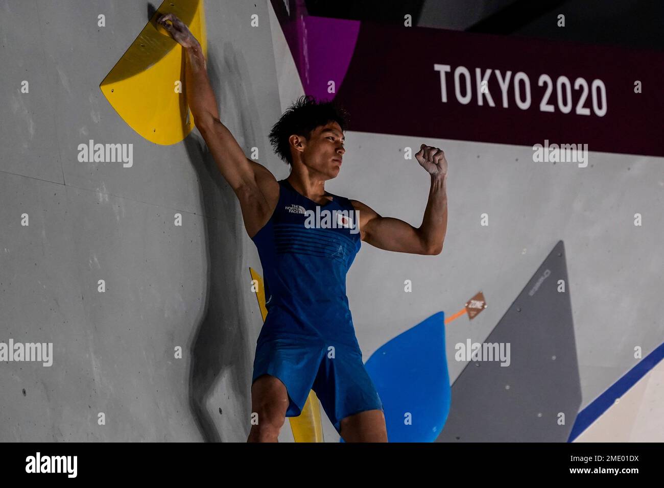 Tomoa Narasaki, of Japan, celebrates during the bouldering portion of ...