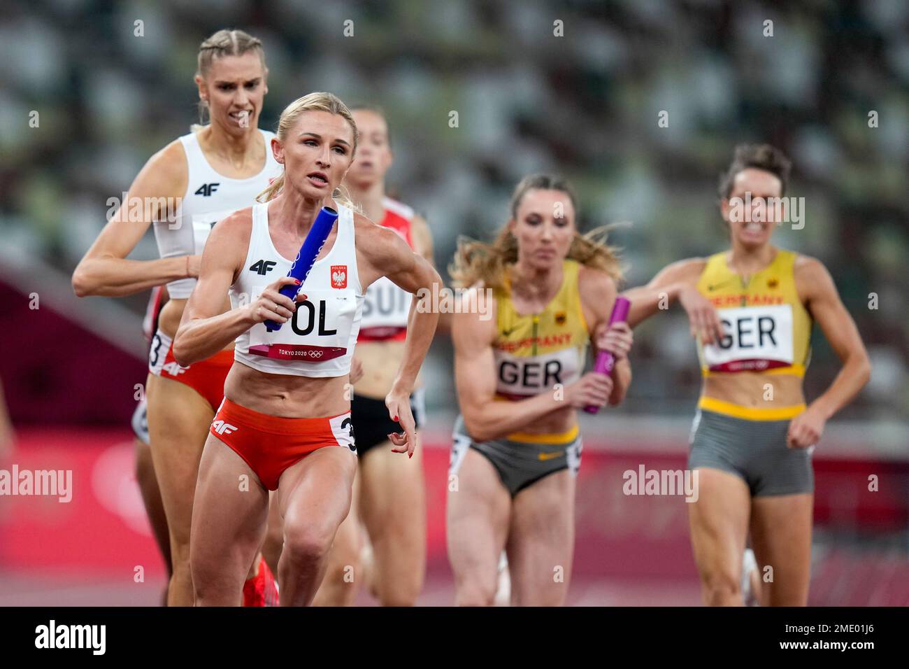 The team from Poland competes in a heat of the women's 4 x 400-meter ...