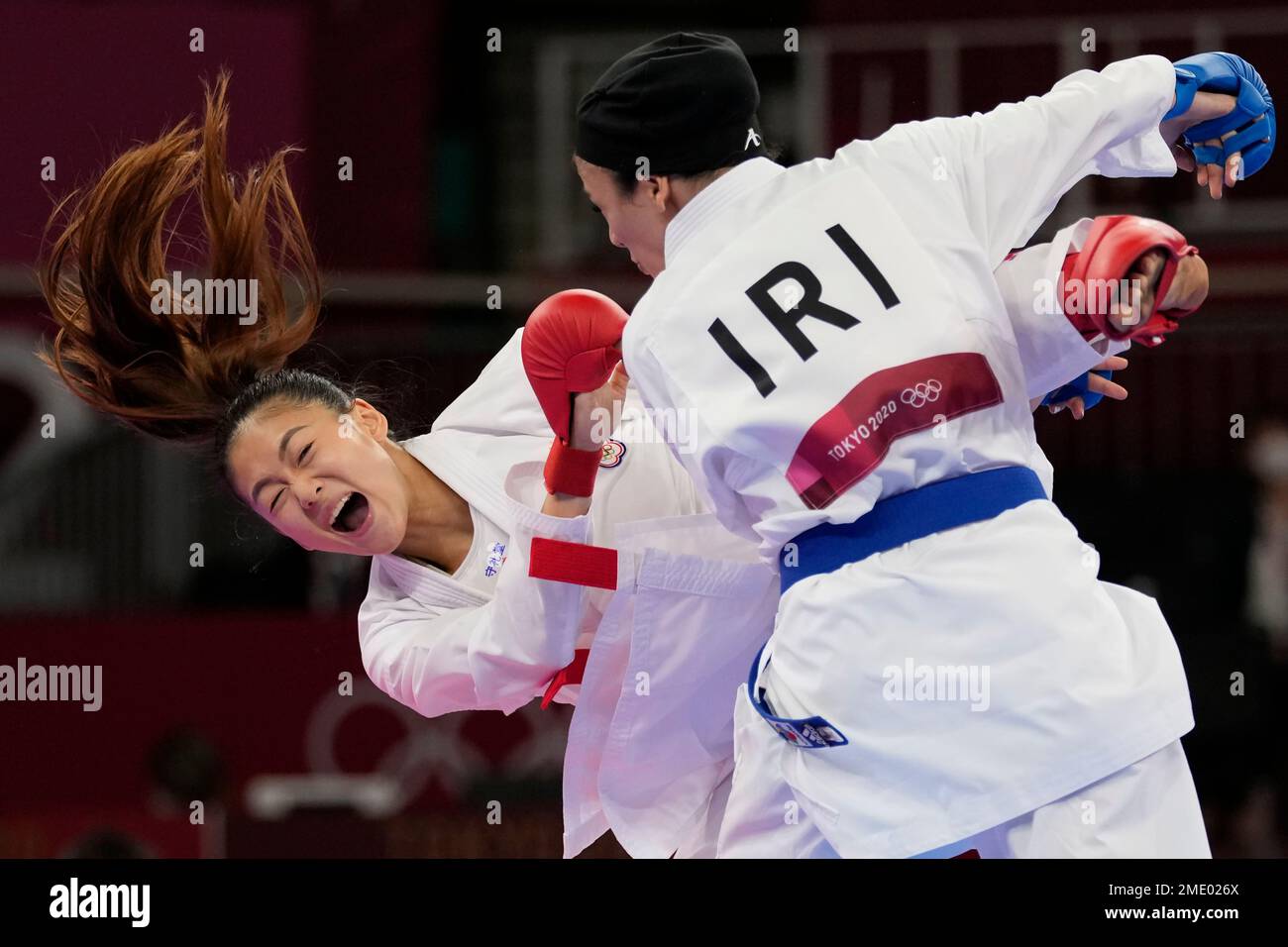 Wen Tzu-yun of Taiwan, left, and Sara Bahmanyar of Iran compete in the ...