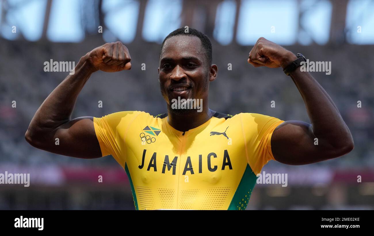 Hansle Parchment, of Jamaica celebrates winning the gold medal in the ...