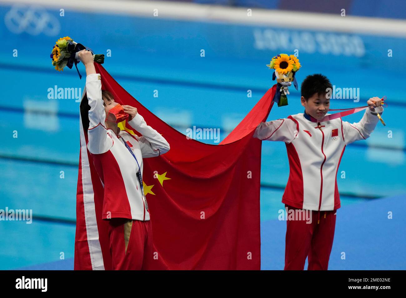 Second placed Chen Yuxi, left, and first placed Quan Hongchan, both of ...