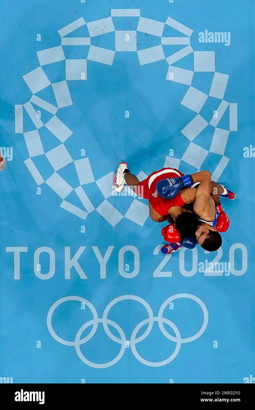 Duke Ragan, of the United States, in red, and Albert Batyrgaziev, of ...