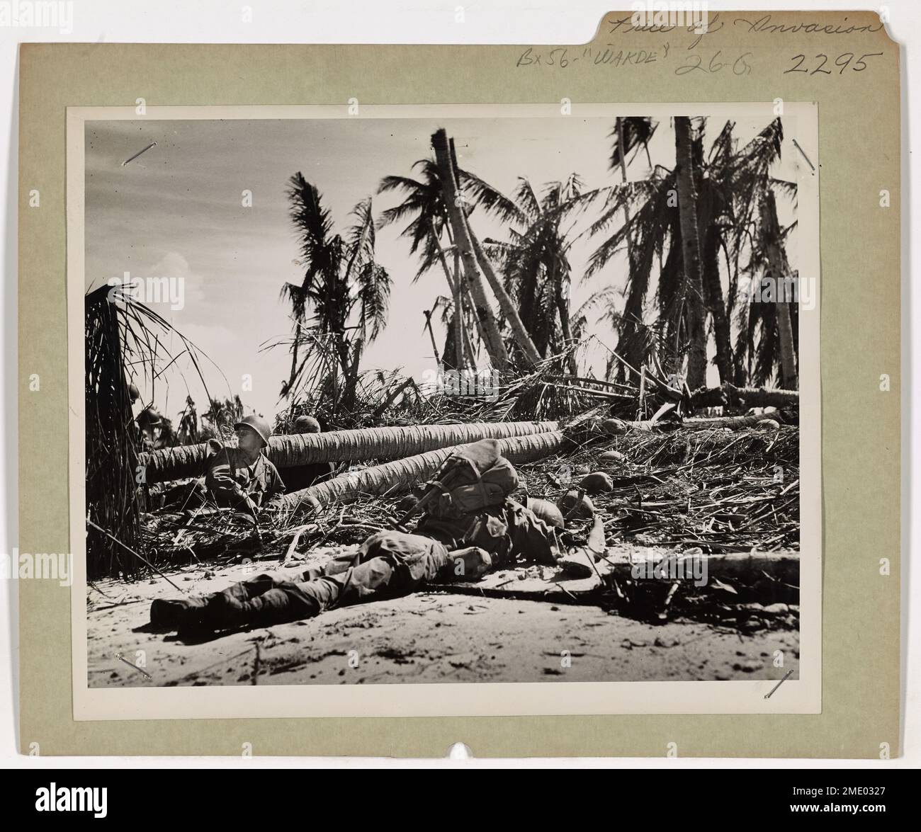 A fallen American soldier lies on the beach at Wakde Island, a victim ...