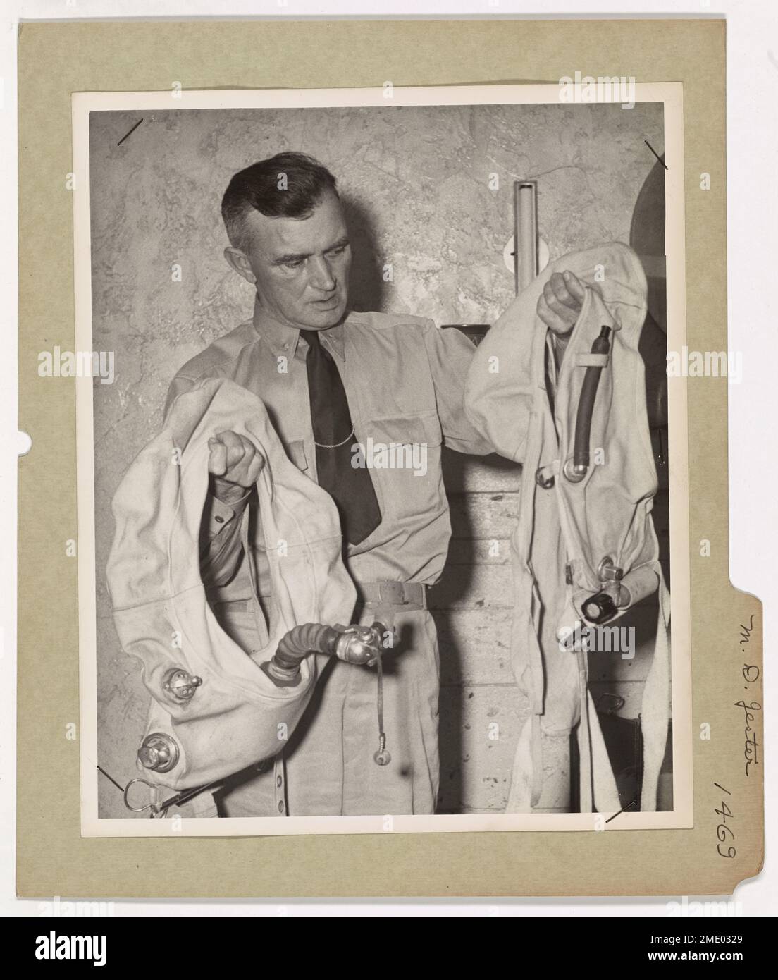 Lieutenant Commander Maurice D. Jester of the U.S. Coast Guard displays ...