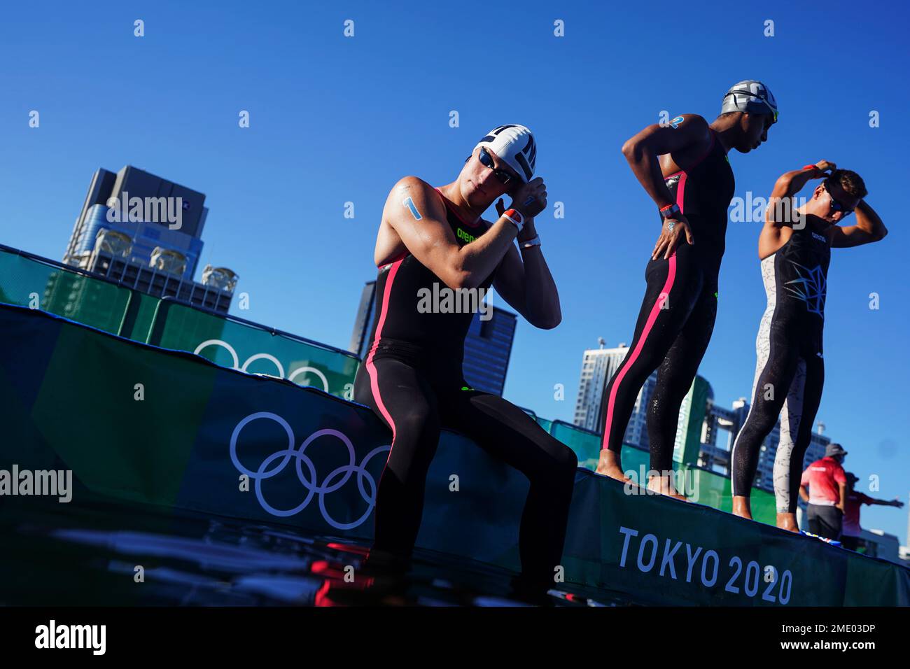 Phillip Seidler, of Namibia, puts his cap on before the start of the ...