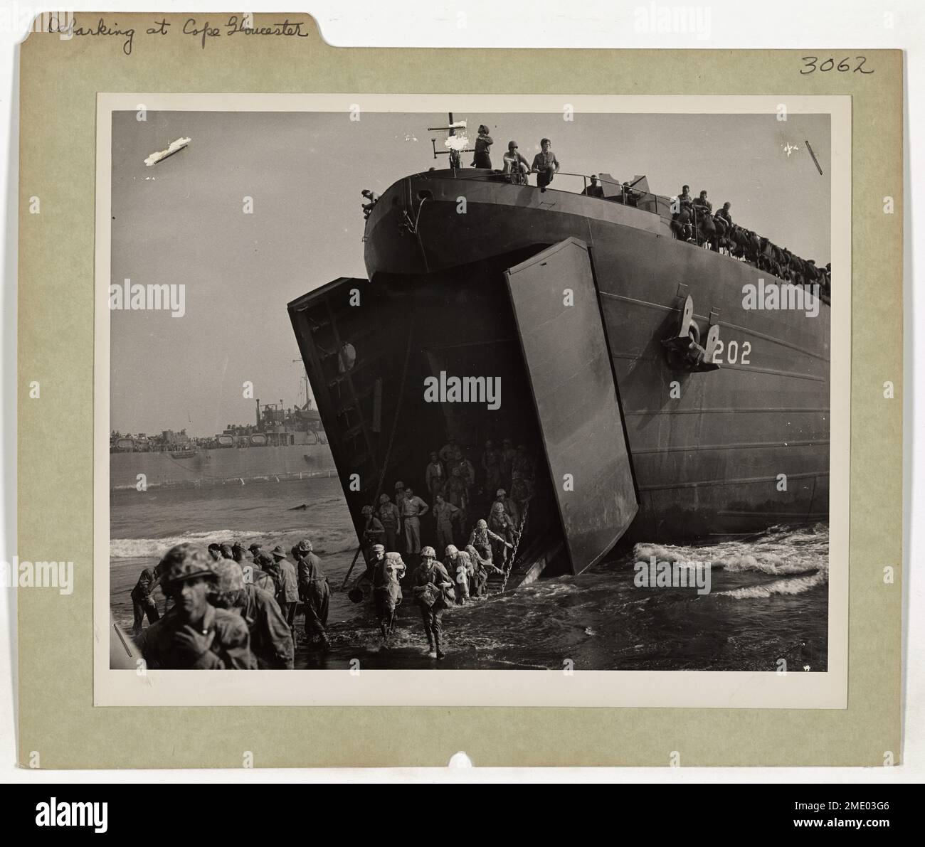 U.S. Marines disembark from a U.S. Coast Guard-manned LST at Cape ...
