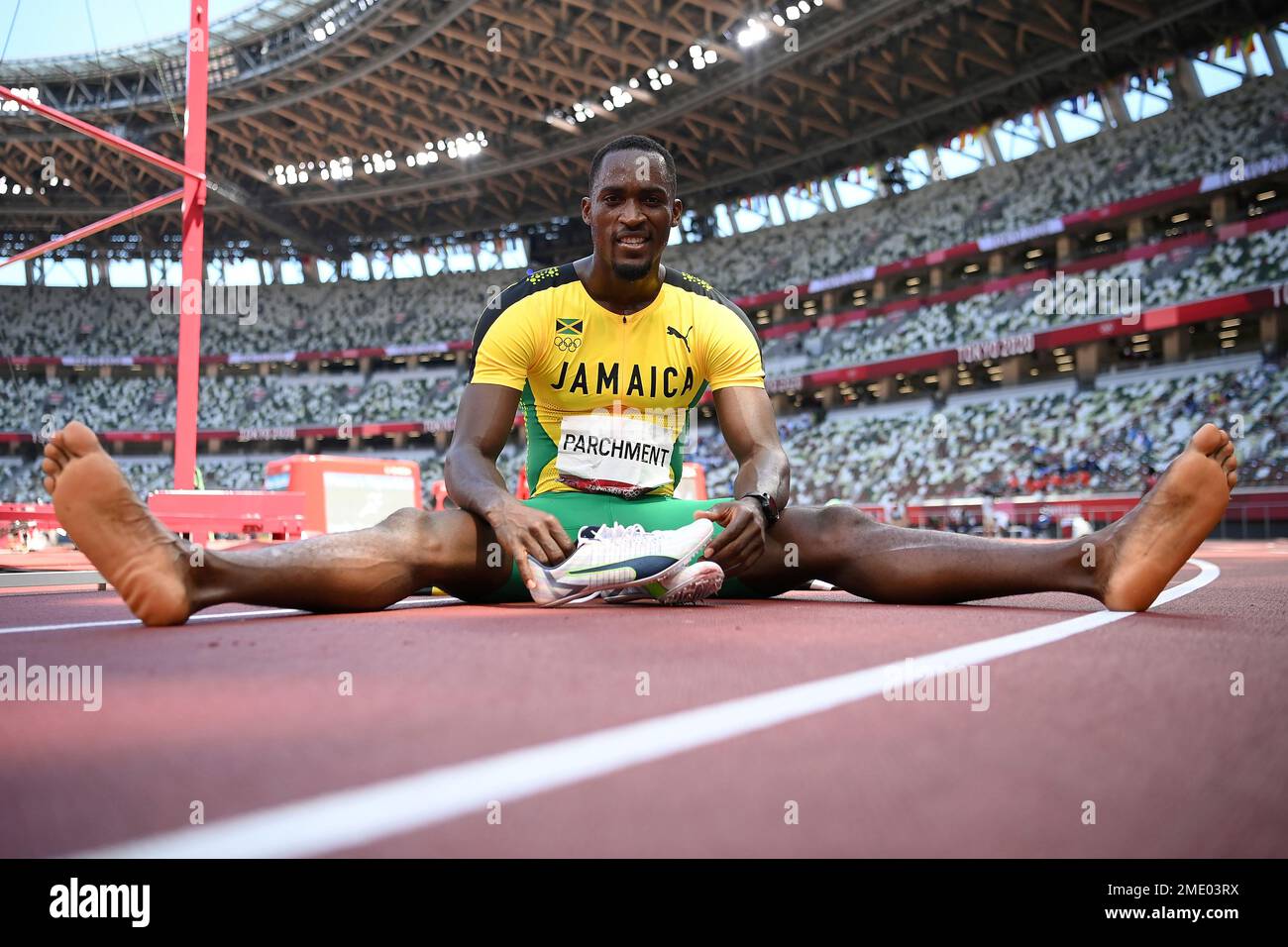 Hansle Parchment, of Jamaica celebrates winning the gold medal in the ...