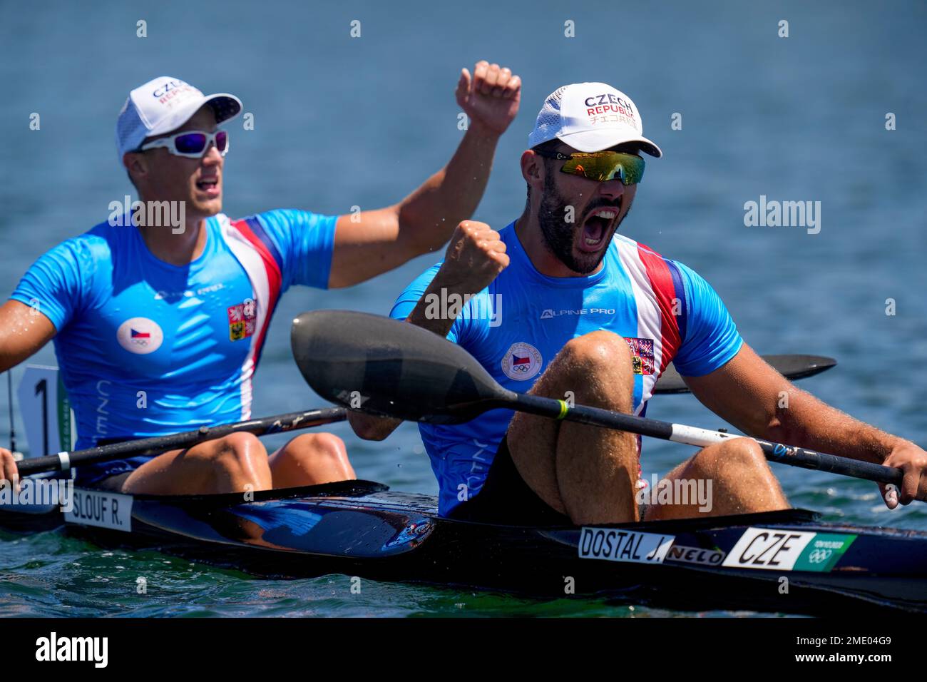 Radek Slouf, and Josef Dostal, of the Czech Republic, react after ...