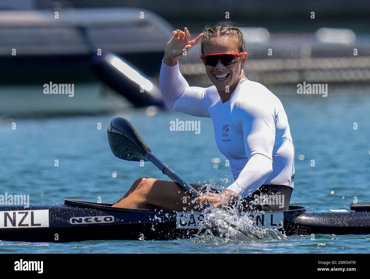 Lisa Carrington, of New Zealand, reacts after winning the gold medal in ...