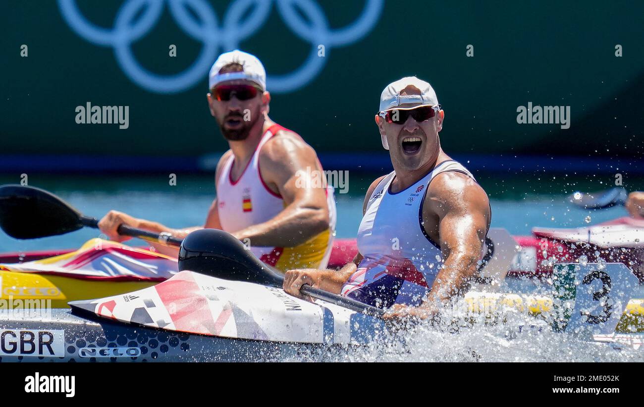 Liam Heath, of Great Britain, right, reacts after his bronze medal ...