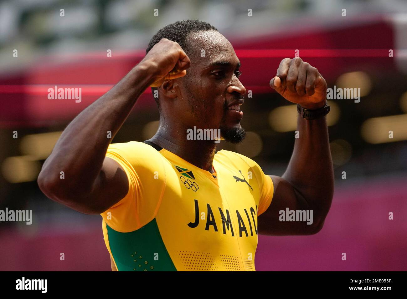 Hansle Parchment, of Jamaica, celebrates after winning the men's 110 ...