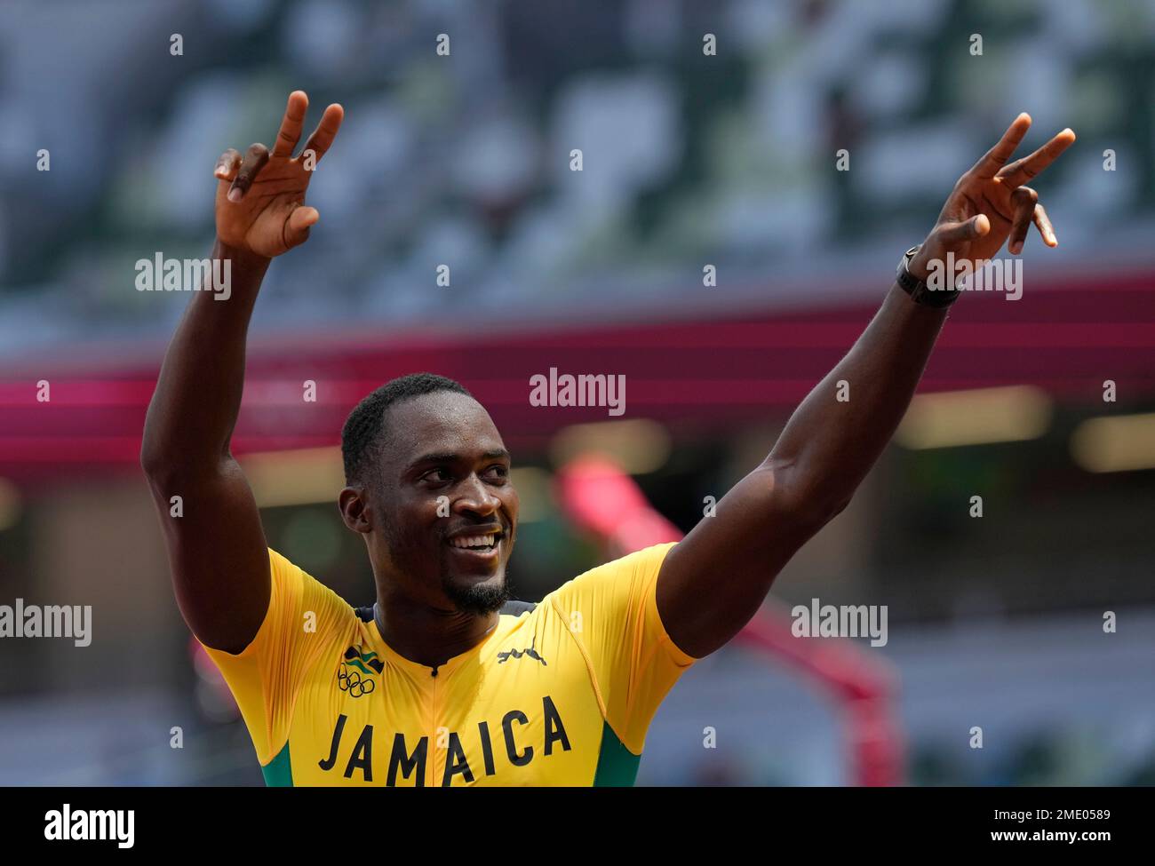 Hansle Parchment, of Jamaica celebrates winning the gold medal in the ...