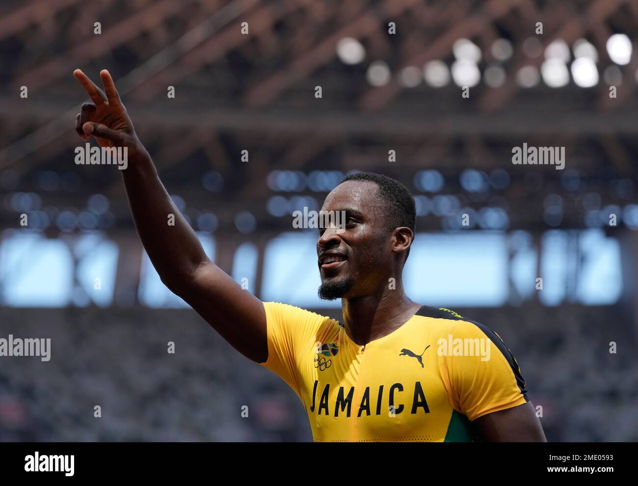 Hansle Parchment, of Jamaica celebrates winning the gold medal in the ...