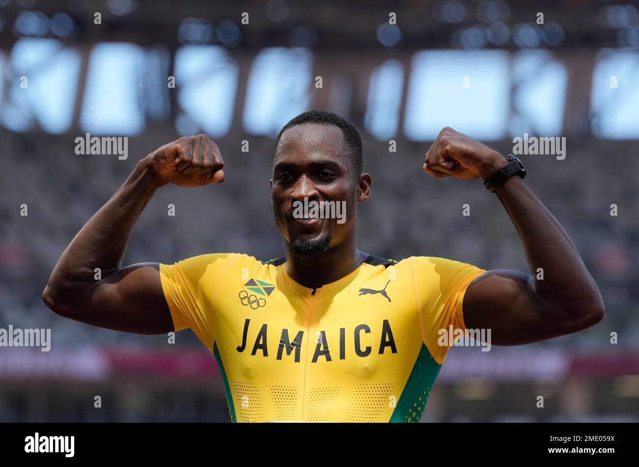 Hansle Parchment, of Jamaica celebrates winning the gold medal in the ...