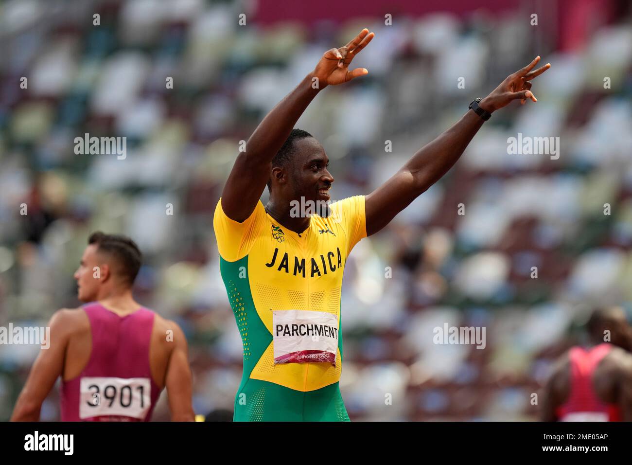 Hansle Parchment, of Jamaica, celebrates after winning the men's 110 ...
