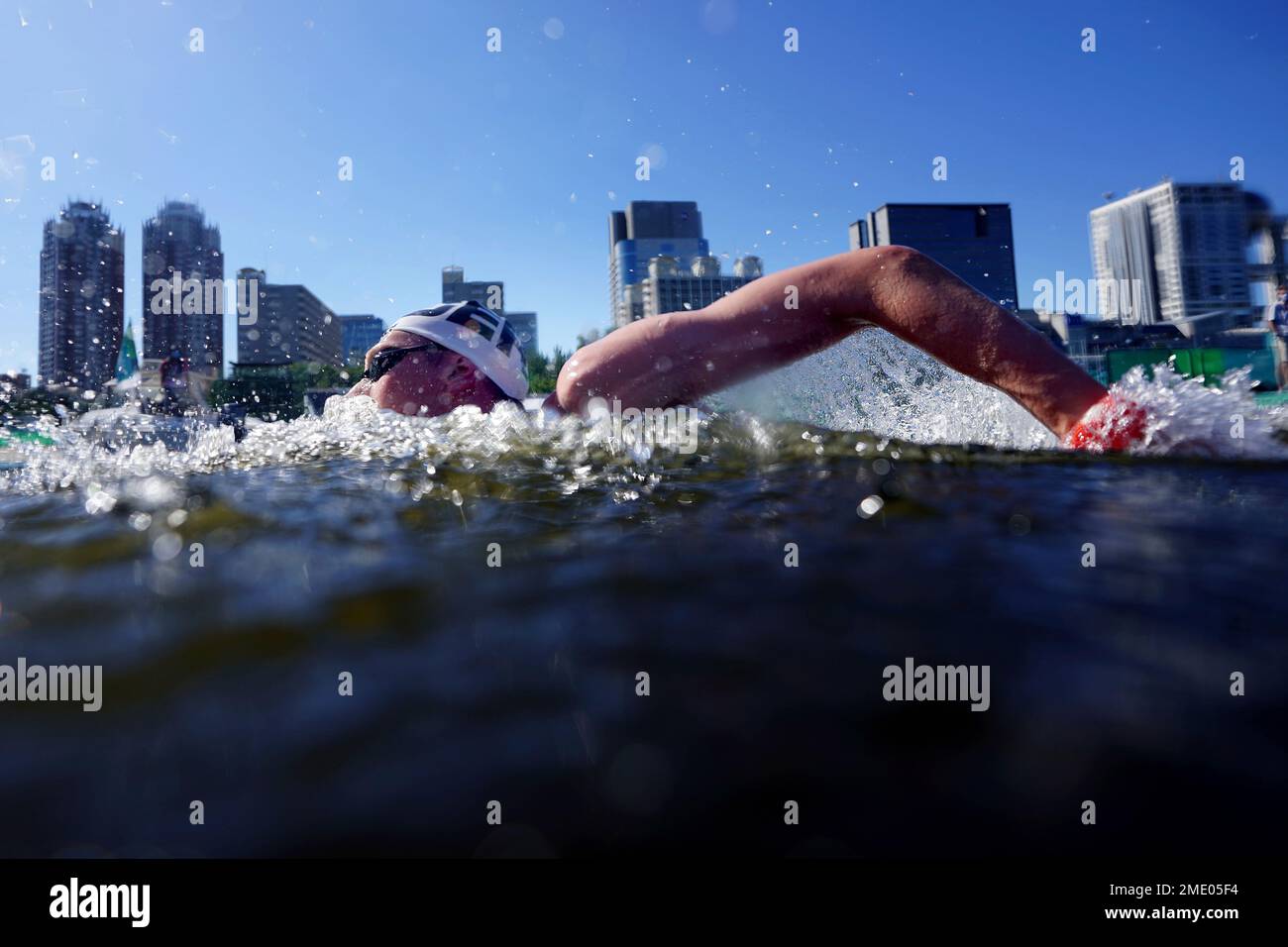 Florian Wellbrock, of Germany, swims during the men's marathon swimming ...
