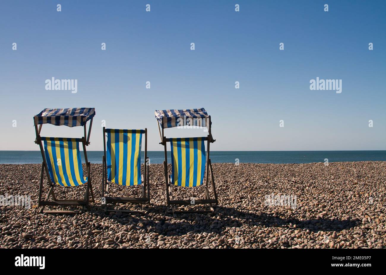 A view of the lounge chairs by the beach Stock Photo - Alamy