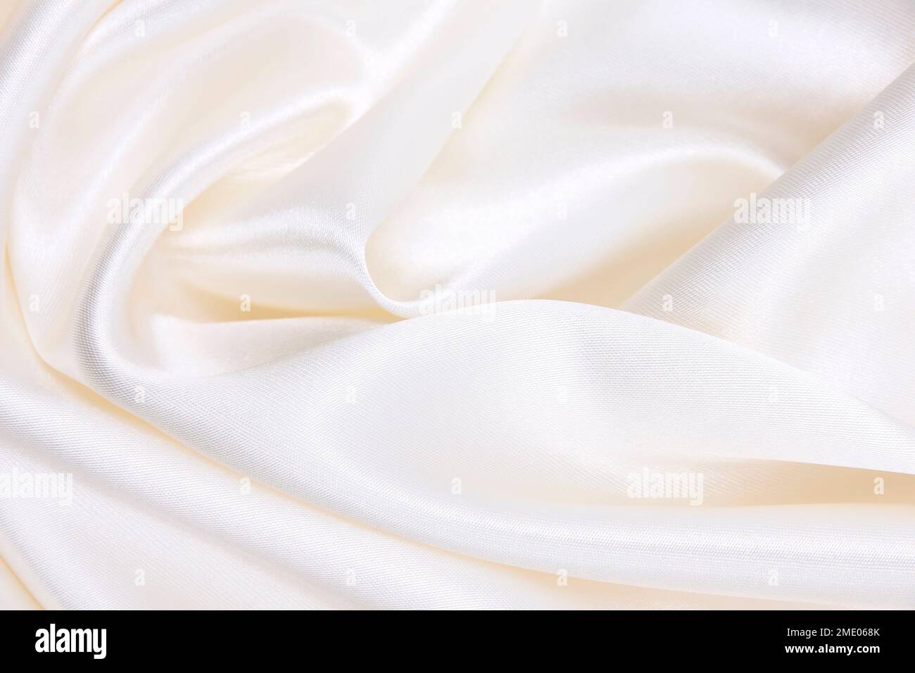 Smooth elegant white silk or satin luxury cloth texture can use as ...