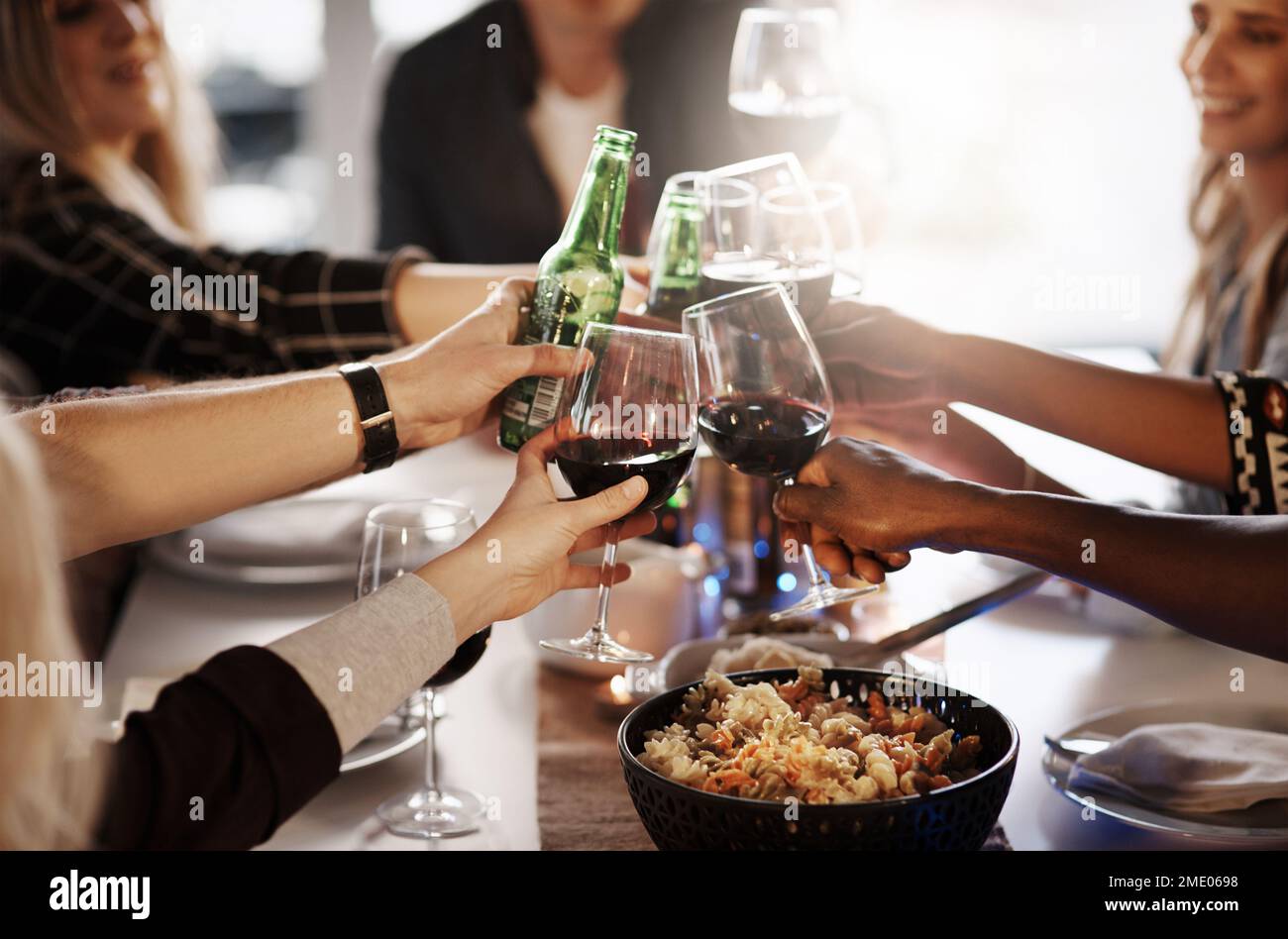 Cheers to making friendship a priority. a group of young friends making ...