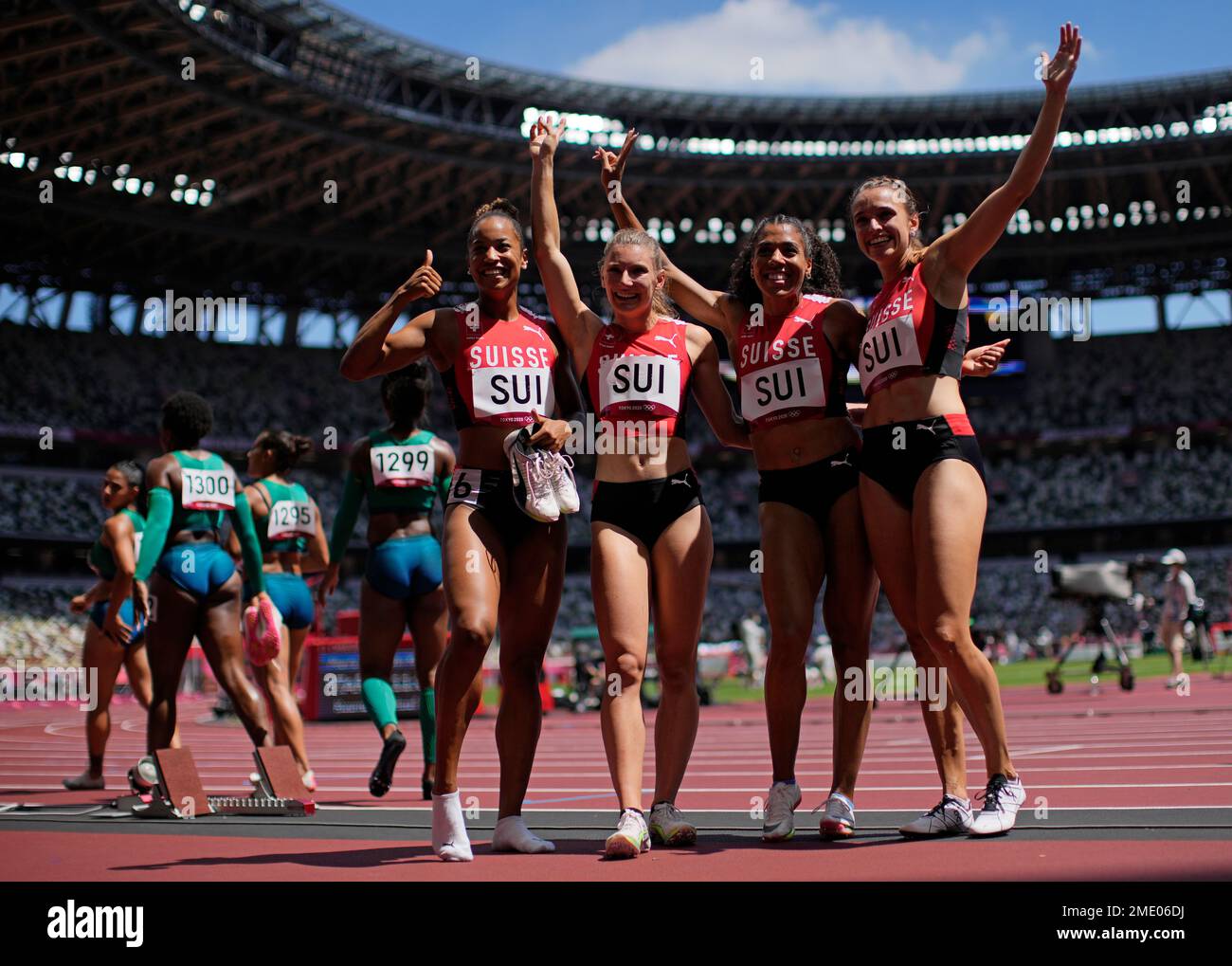 The Swiss team celebrate after placing second in a semifinal of the ...