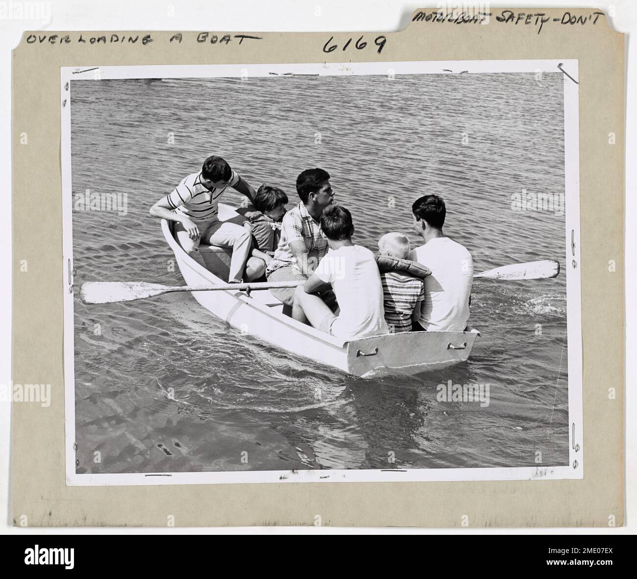 Overloading a small rowboat can be dangerous, as seen in this image ...