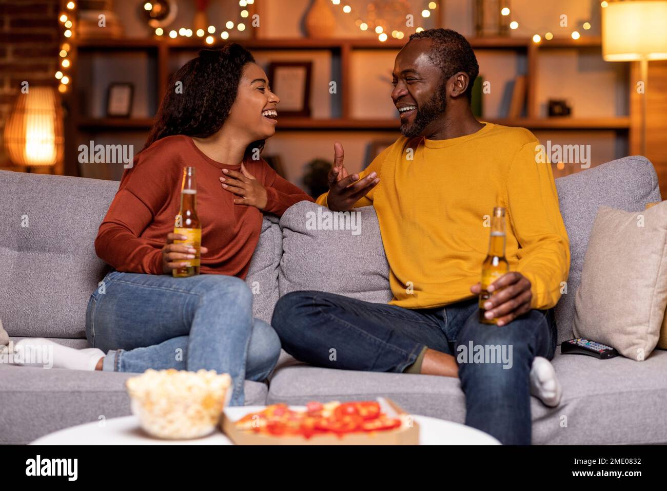 Black couple in love having date at home Stock Photo - Alamy