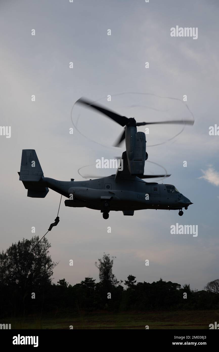 U.S. Marines with Marine Wing Support Squadron (MWSS) 171 fast rope out ...