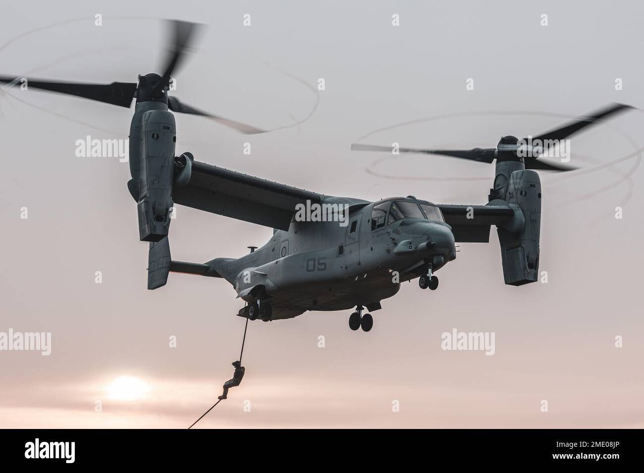 U.S. Marines with Marine Wing Support Squadron (MWSS) 171 fast rope out ...
