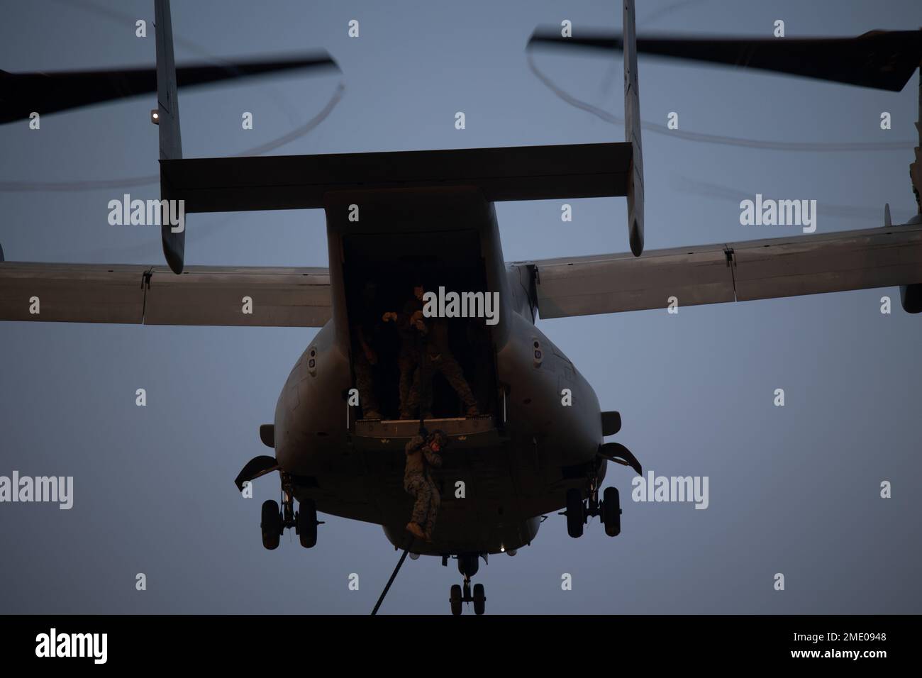 U.S. Marines with Marine Wing Support Squadron (MWSS) 171 fast rope out ...