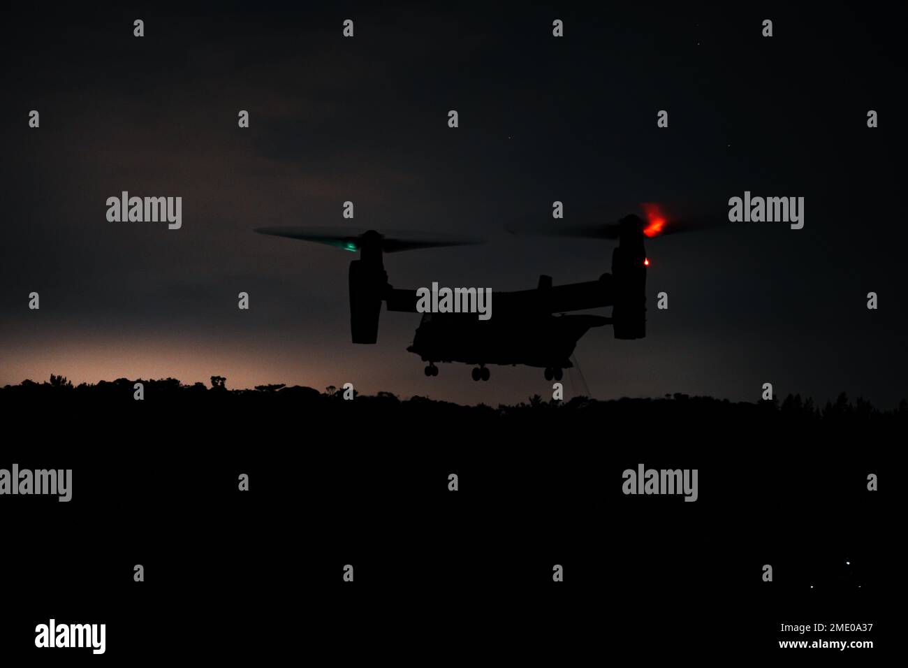 U.S. Marines with Marine Wing Support Squadron (MWSS) 171 fast rope out ...