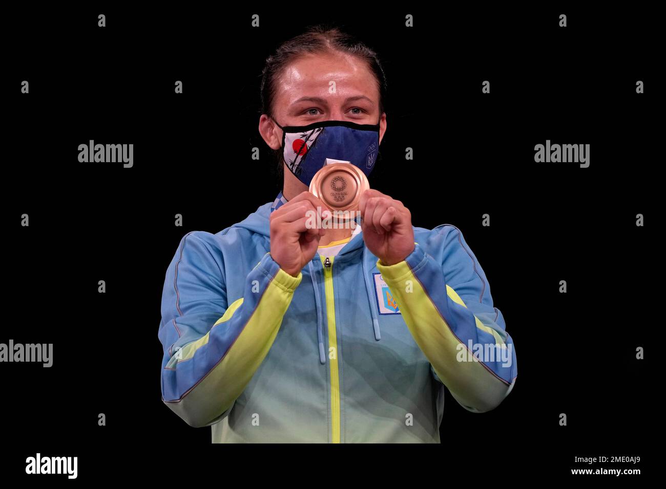 Bronze medalist, Ukraine's Iryna Koliadenko celebrates on the podium ...